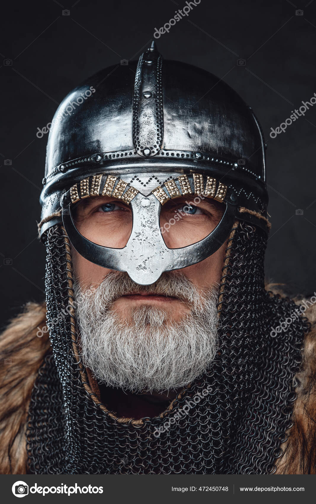 Serious elder templar with fur and steel helmet — Stock Photo ...