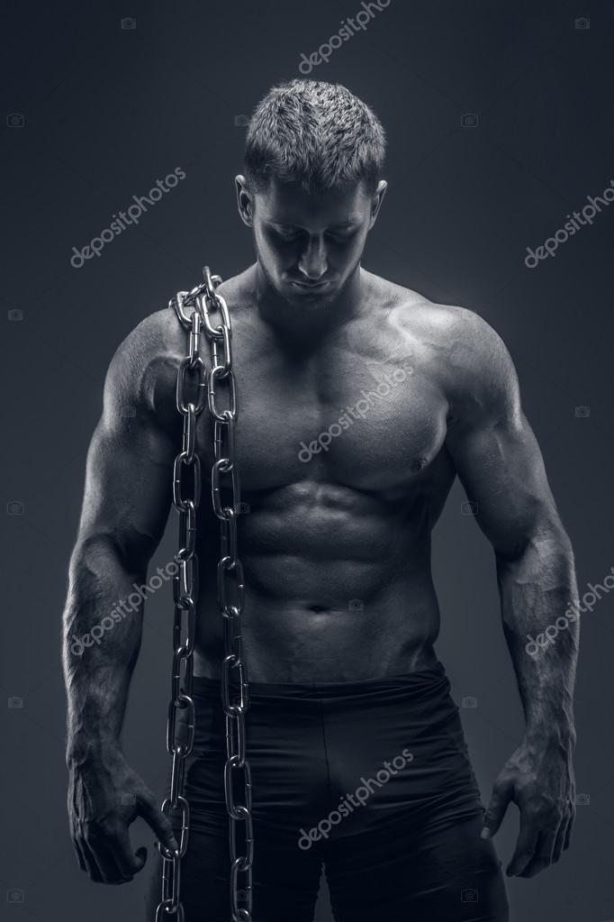 Masculin Musculaire Montrant Son Corps Musculaire Image Libre De Droit