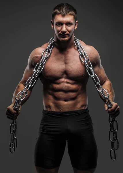 Muscular male holds the chain Stock Photos, Royalty Free Muscular male ...