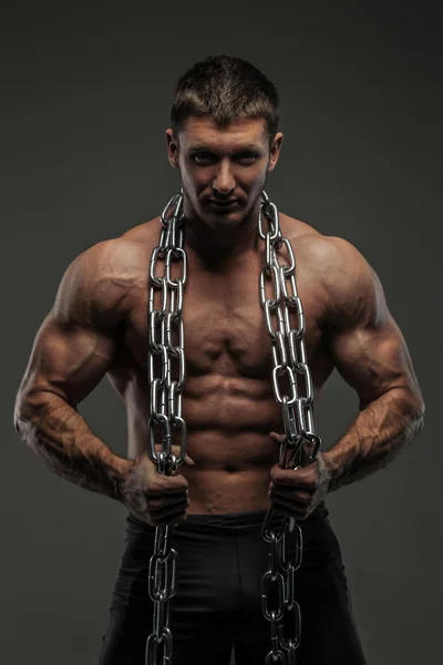 Muscular male holds the chain Stock Photos, Royalty Free Muscular male ...