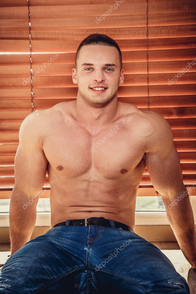 Shirtless muscular smiling guy — Stock Photo © fxquadro #77251036