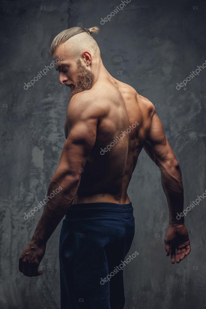 Muscular guy from back — Stock Photo © fxquadro #80998822
