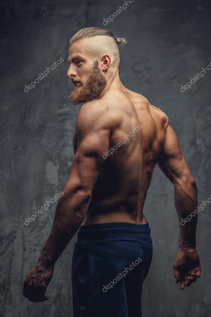 Shirtless muscular guy from back Stock Photo by ©fxquadro 81115428