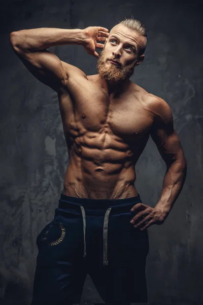Muscular man with beard showing his great body. Stock Photo by ...