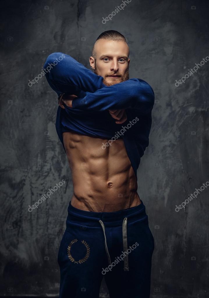 Muscular guy with beard — Stock Photo © fxquadro #83438574