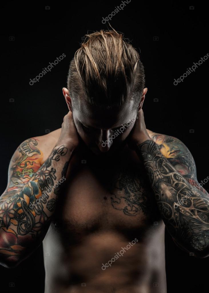 Awesome man with tattoos. Stock Photo by ©fxquadro 85017700