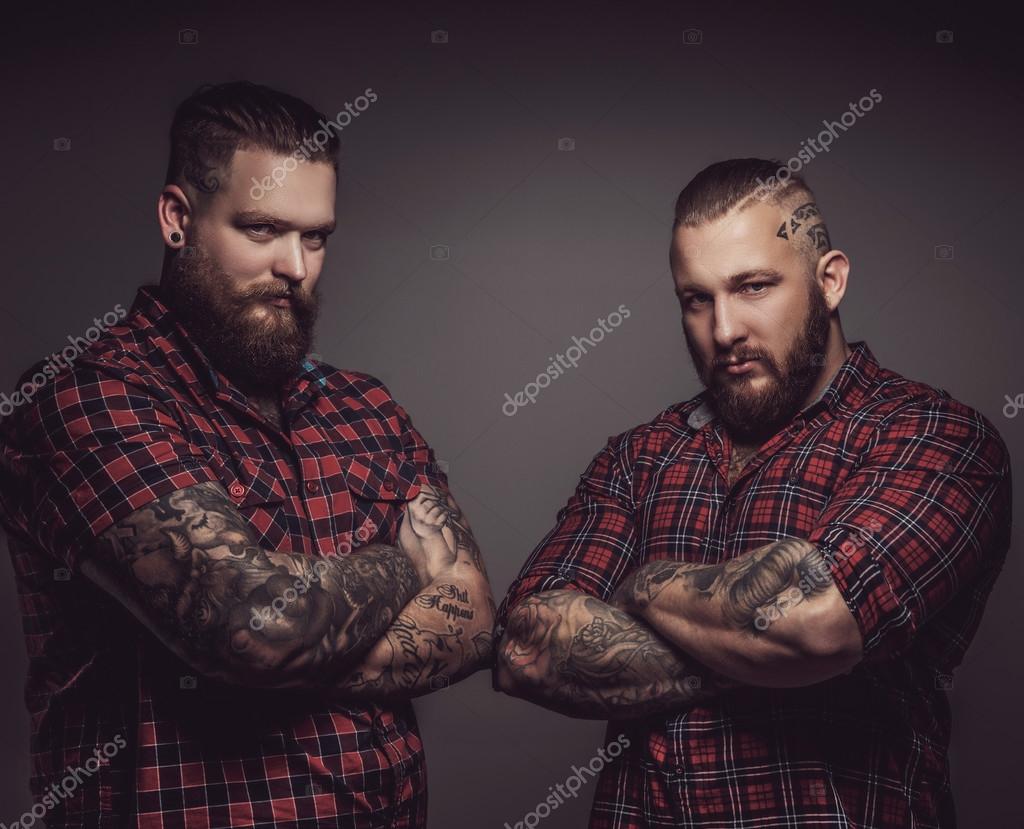 Two brutal mans with beards. Stock Photo by ©fxquadro 85017882