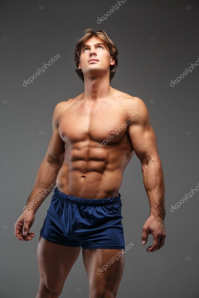 Half body portrait of muscular guy — Stock Photo © fxquadro #86692986