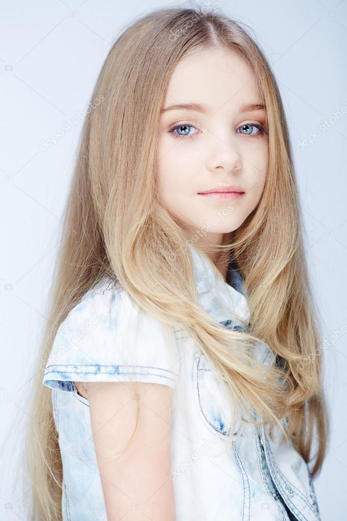 Pretty Girl With Light Brown Hair And Blue Eyes