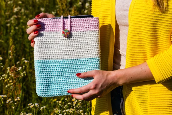 Tablet computer in a knitted cover - Stock Image - Everypixel