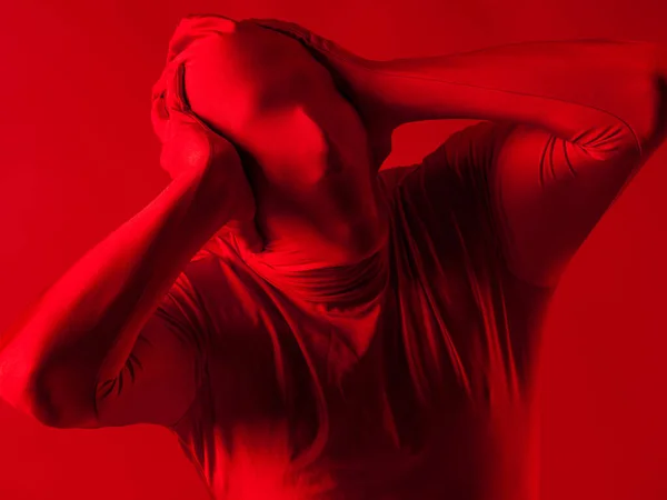 Crazy red man on a red background. figure in a leotard covering the ...