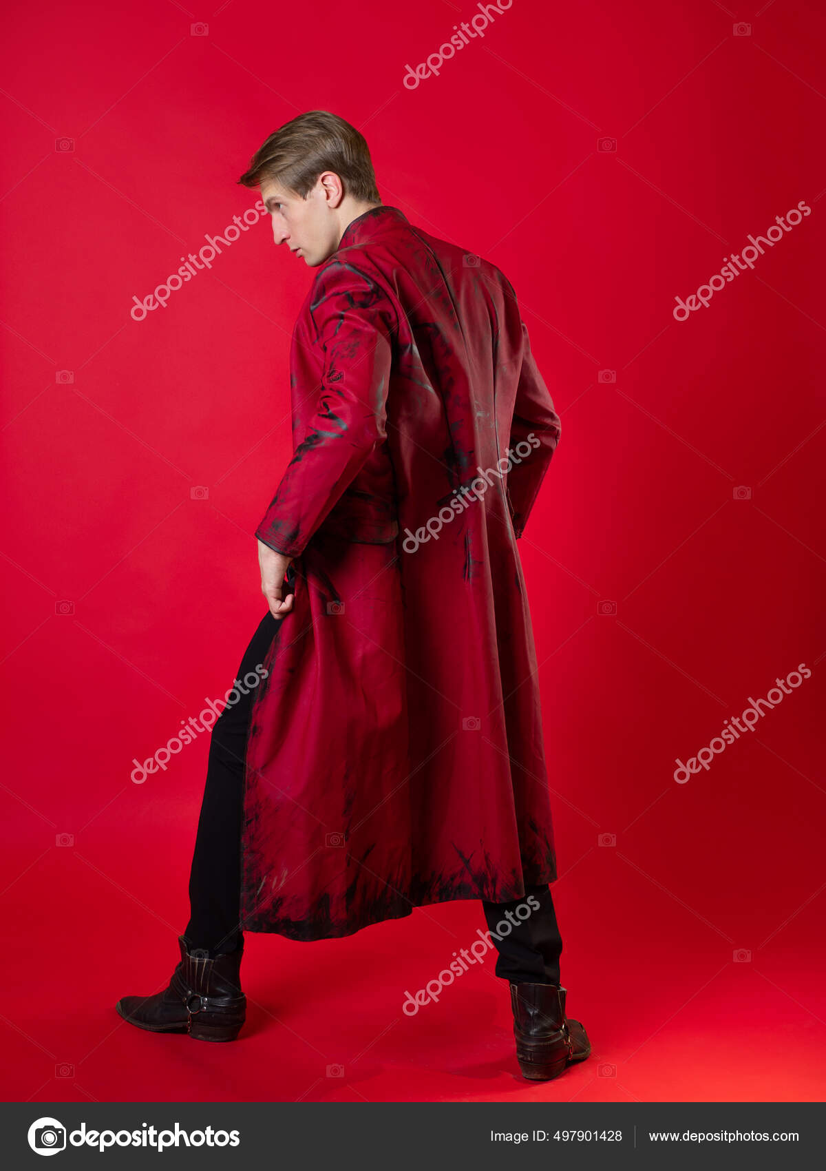 An outrageous young man in a daring red coat in a vintage noir style ...