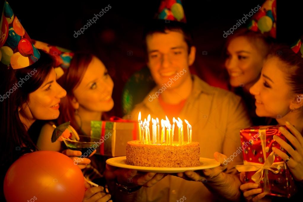 People celebrating birthday with cake — Stock Photo © yanlev #90288560