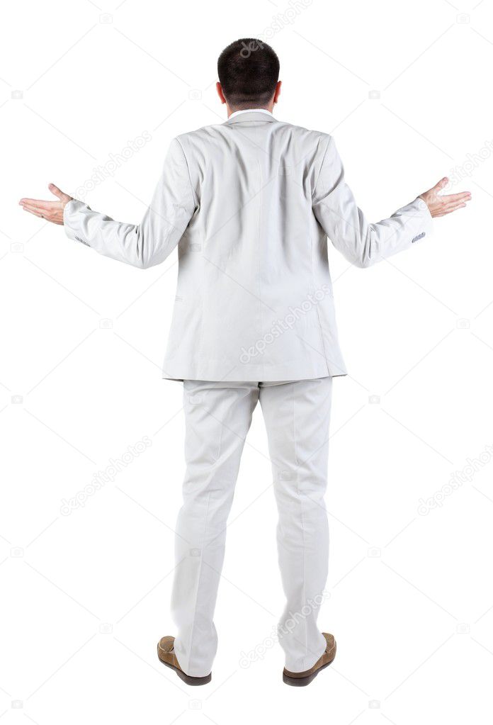Back view of shocked and scared young business man. Stock Photo by ...