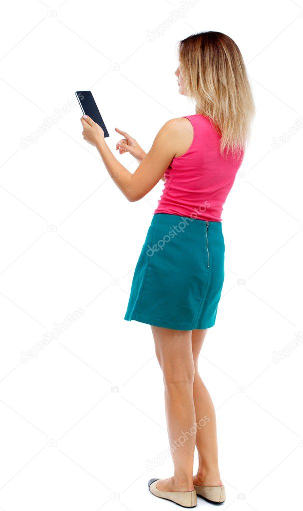 Back view of standing young beautiful woman using a mobile phon Stock ...