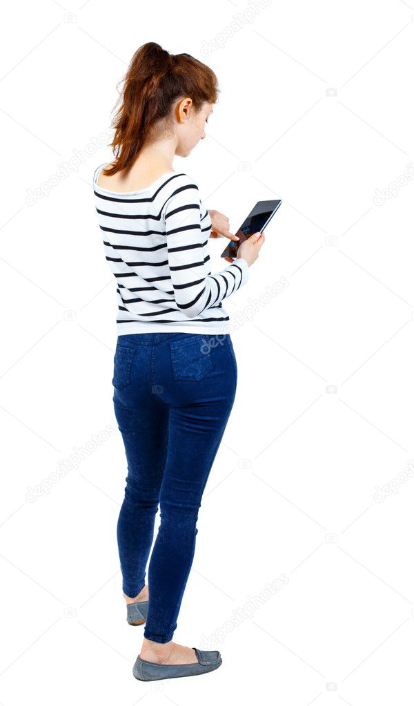 Back view of standing young beautiful woman using a mobile phon — Stock ...