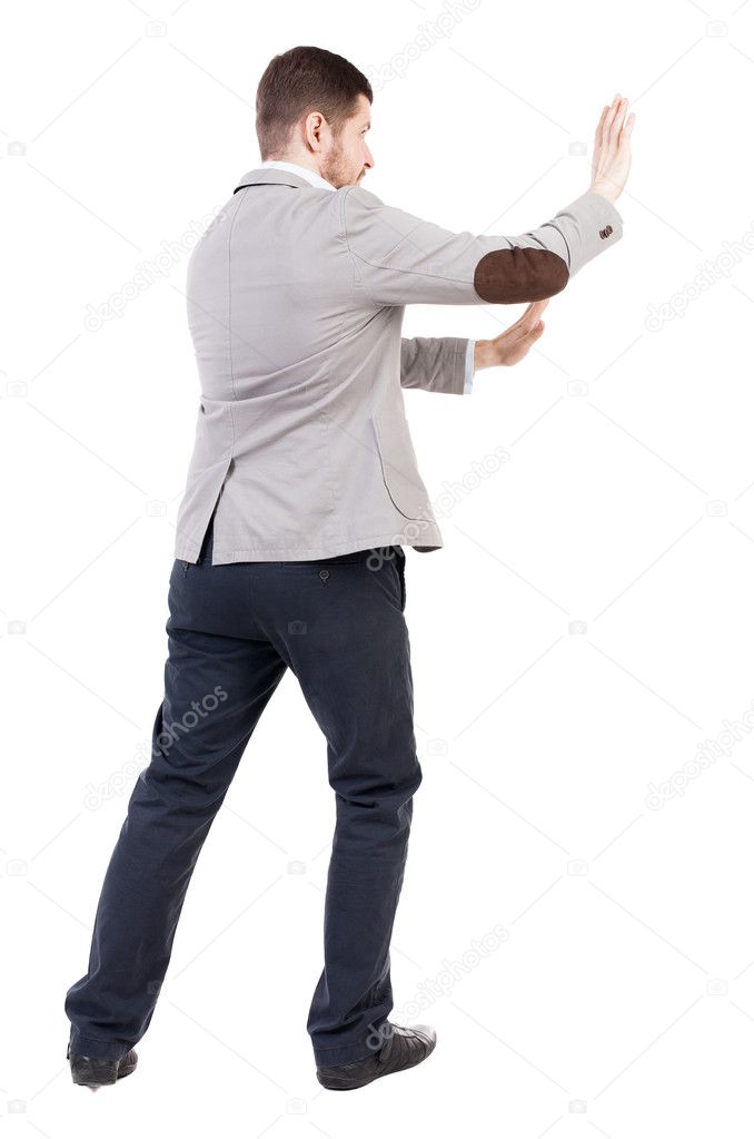 Hands Pushing A Wall