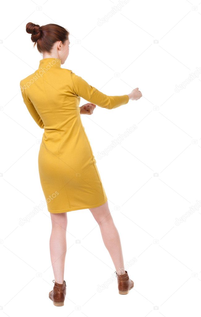 Back view of woman pulling a rope Stock Photo by ©ghoststone 73133381