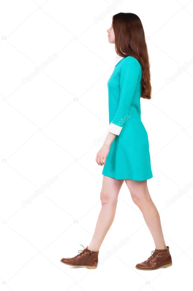 Side view of walking woman. Stock Photo by ©ghoststone 77005233
