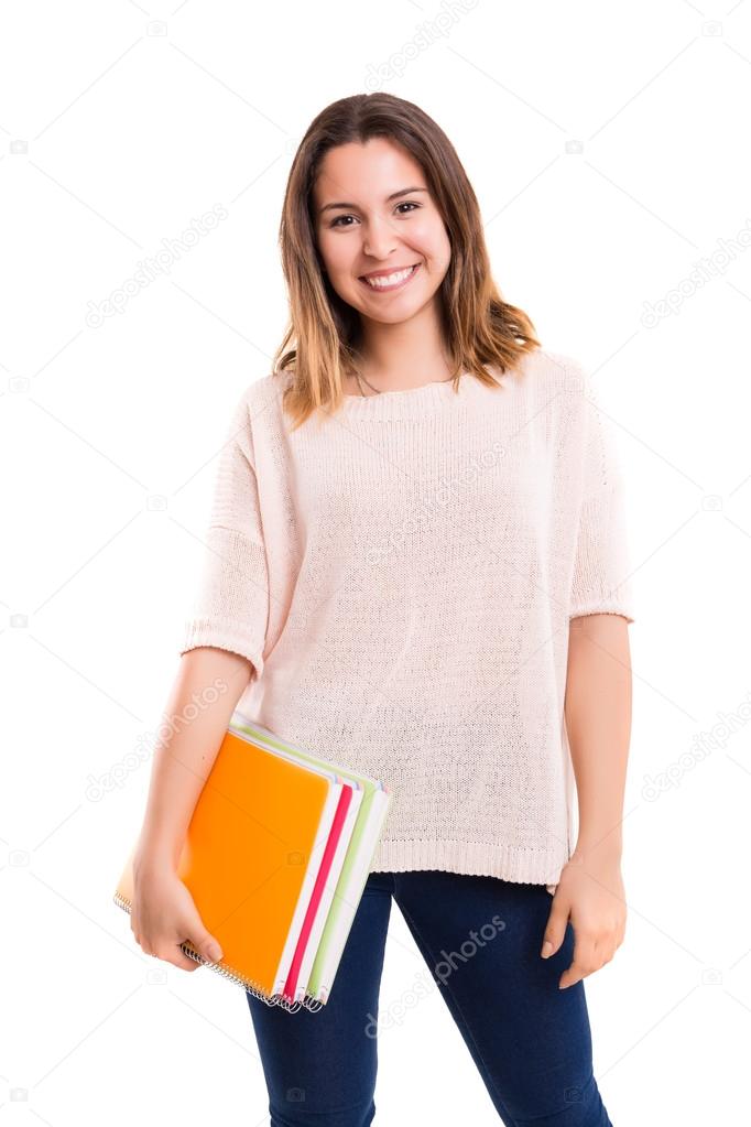 Young student posing with notebooks Stock Photo by ©hsfelix 110476578