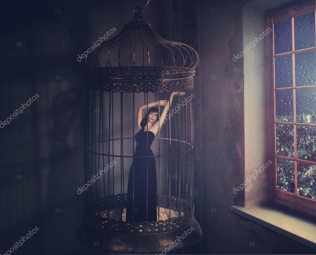 Woman In Cage