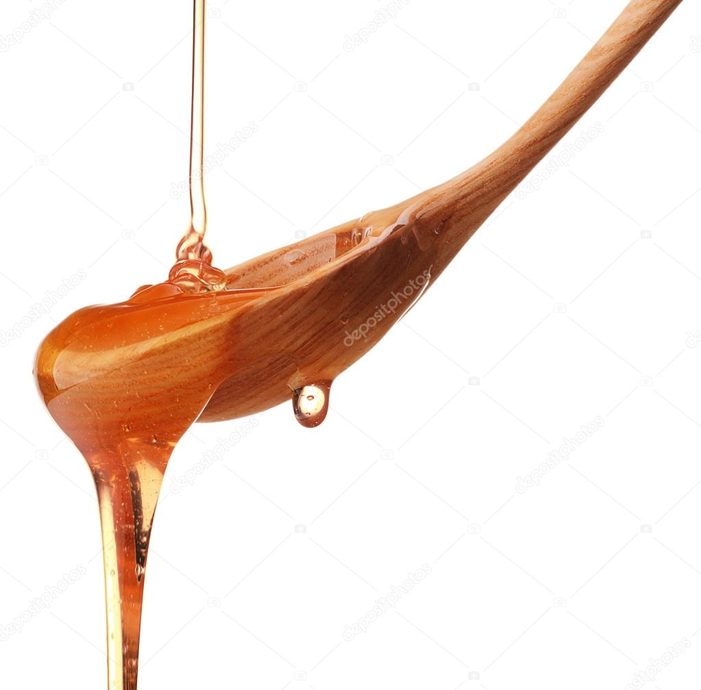 Honey Dripping From A Wooden Honey Dipper Isolated On White Back Stock