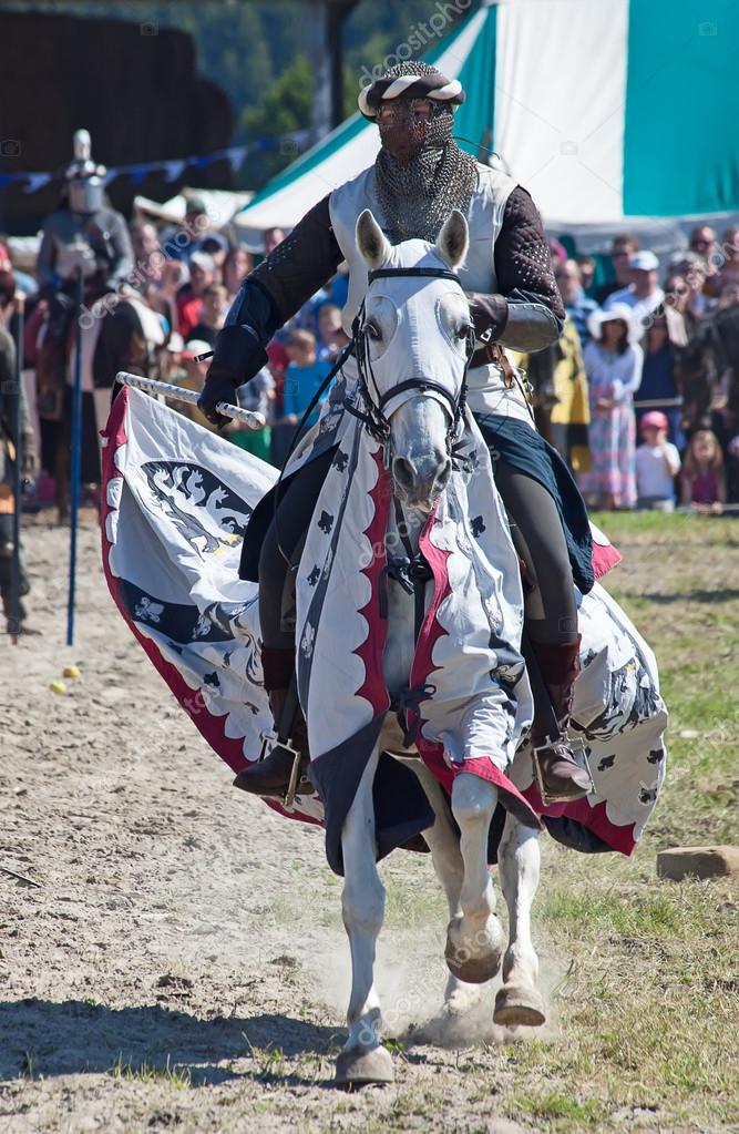 Man in knight armor riding the horse – Stock Editorial Photo ...