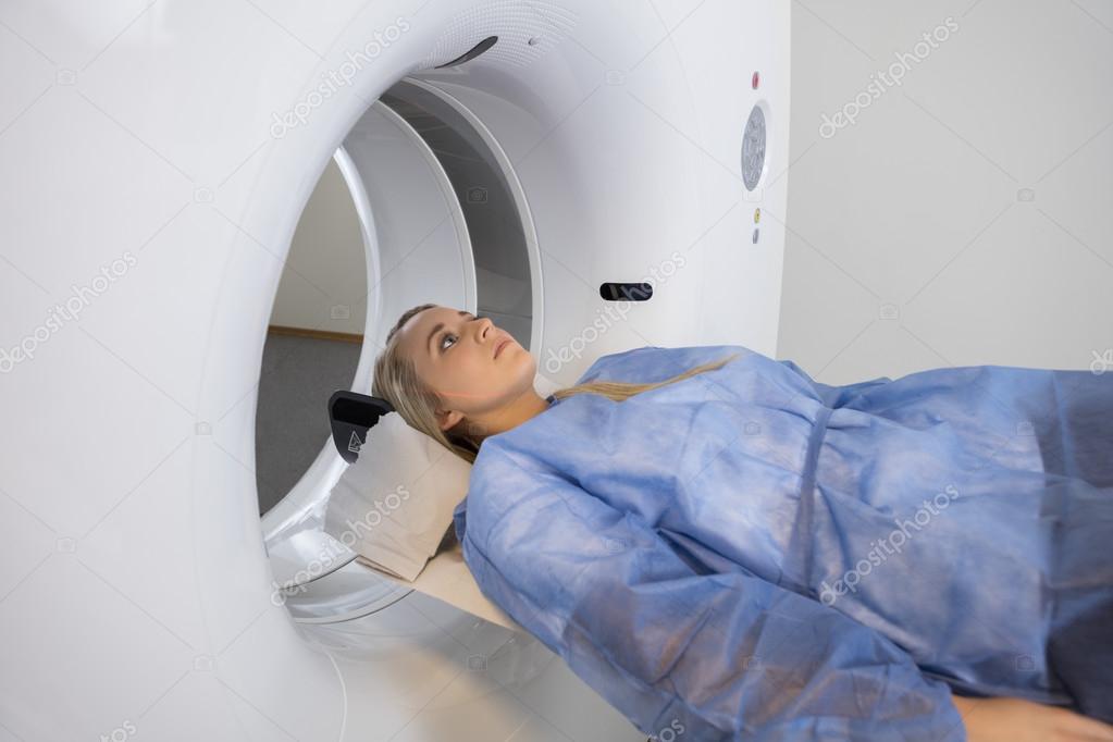 Patient going through CT scan Stock Photo by ©SimpleFoto 122762064