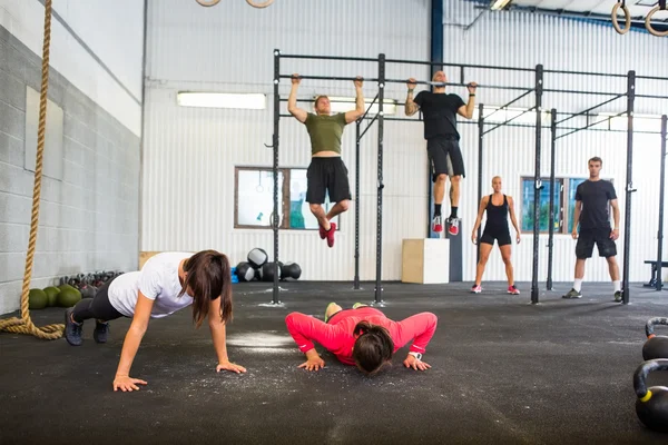 Crossfit group trains different exercises — Stock Photo © kjekol #47266093
