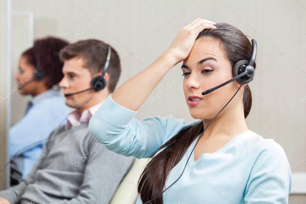 Tired Female Customer Service Representative In Call Center Stock Photo ...