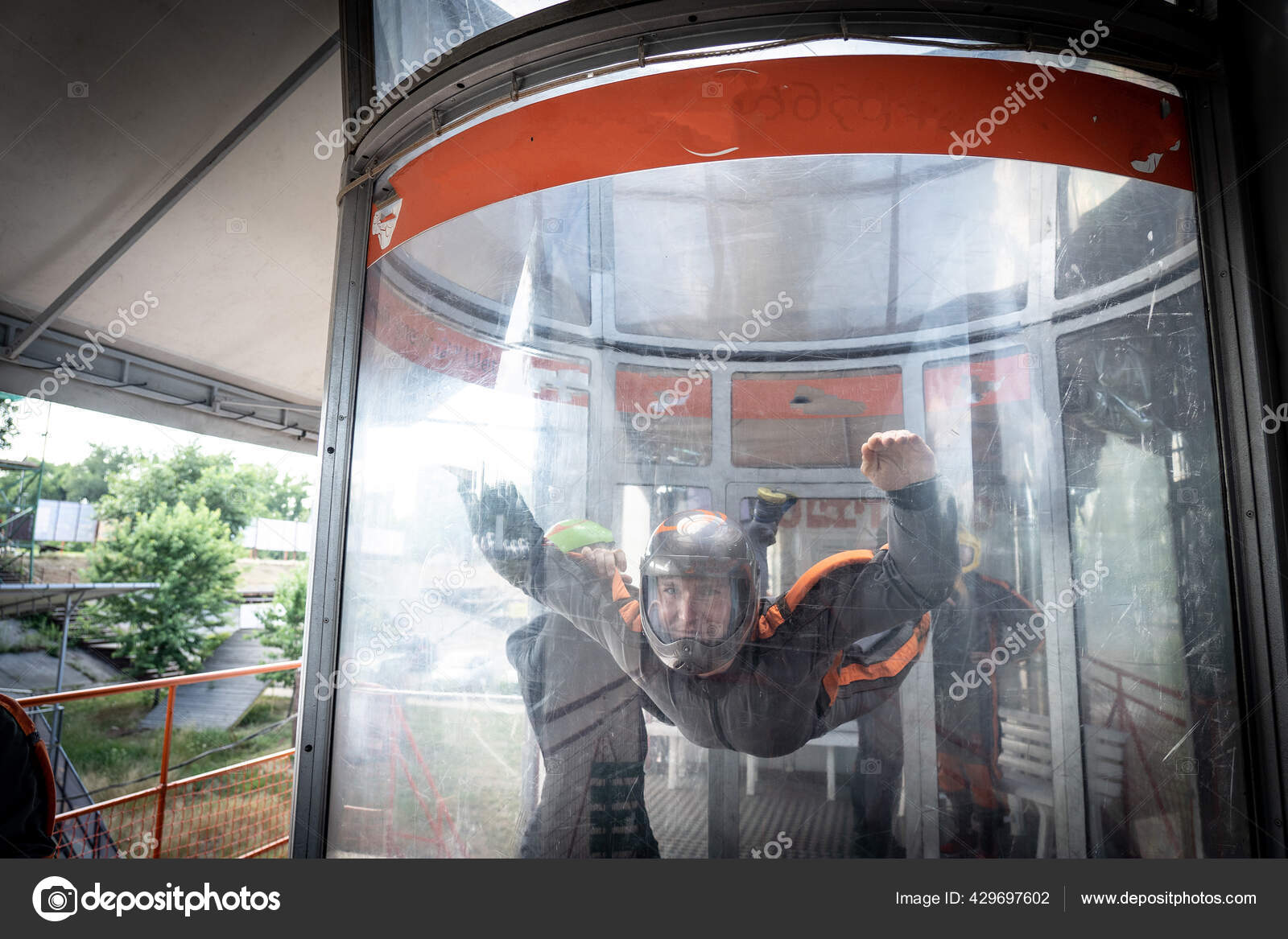 Human flight in the wind tunnel. training for parachute sport — Stock ...