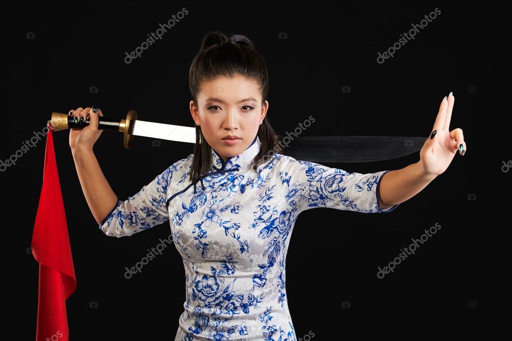 Beautiful woman holding sword — Stock Photo © zoomteam #102279956