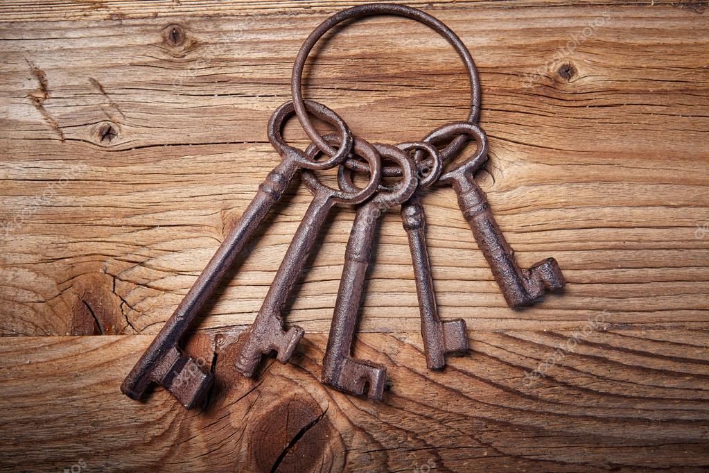 Medieval keys on wood table Stock Photo by ©zoomteam 111805740