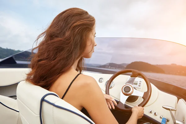 Woman driving boat Images - Search Images on Everypixel
