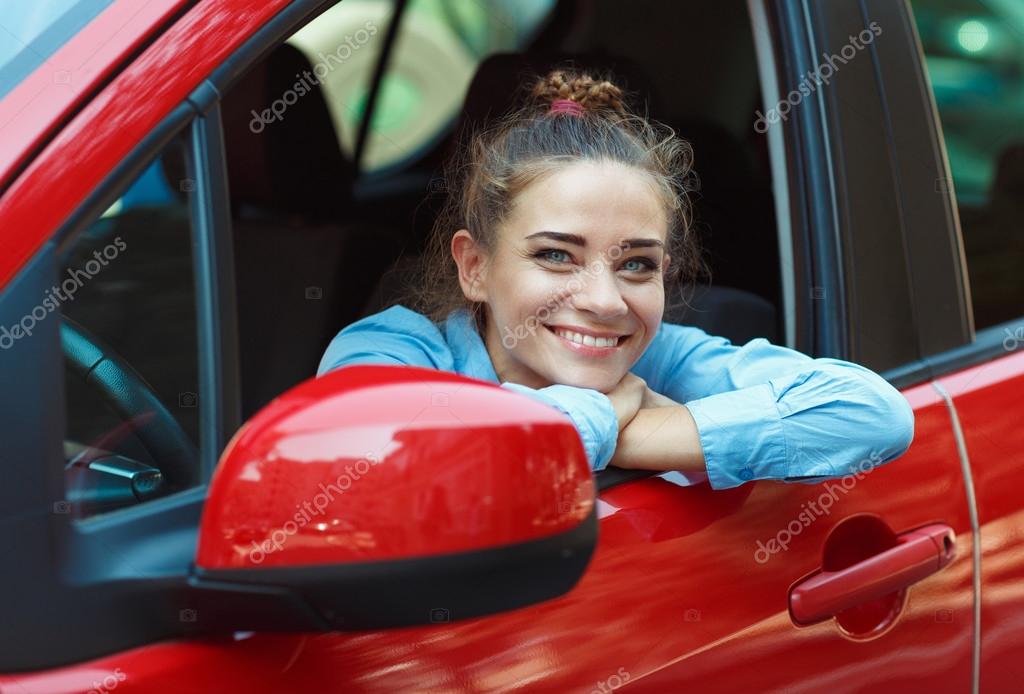 Young woman driving her car ⬇ Stock Photo, Image by © vlad_star #79170366