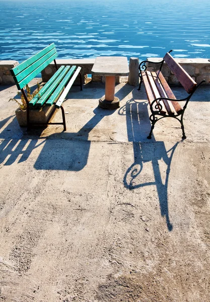 Bench facing the sea Stock Photos, Royalty Free Bench facing the sea ...