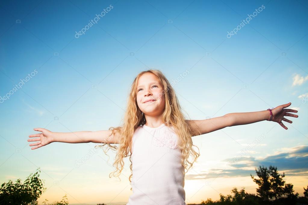 Child with arms outstretched — Stock Photo © TatyanaGl #111329446