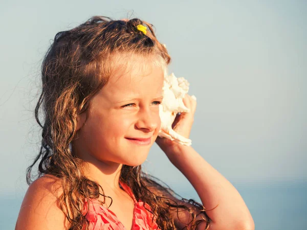 Child on beach — Stock Photo © TatyanaGl #70142447