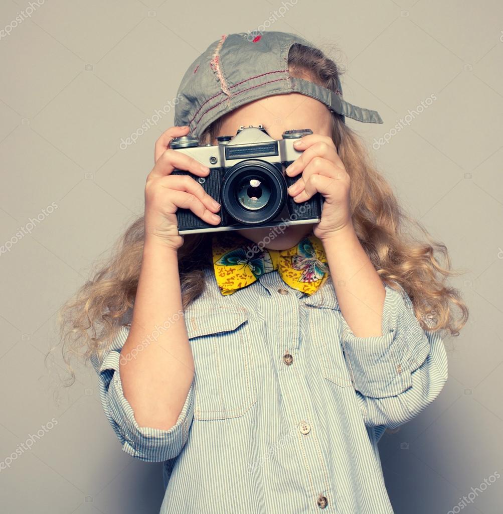 Child with camera. Stock Photo by ©TatyanaGl 66936191