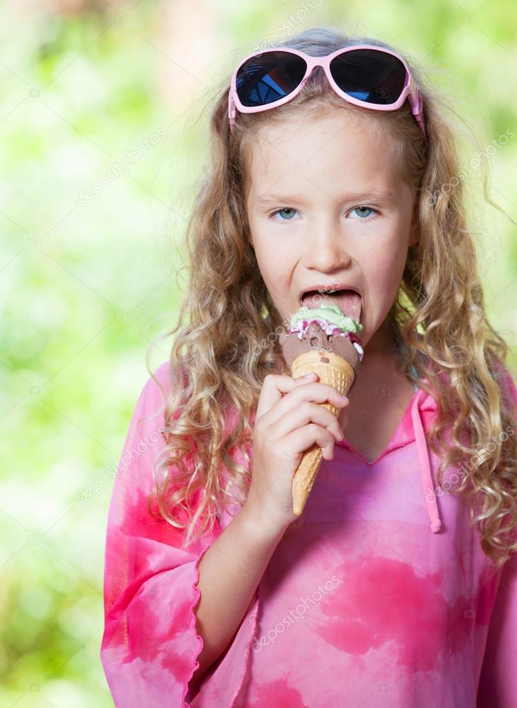 Girl with ice cream — Stock Photo © TatyanaGl #67400351