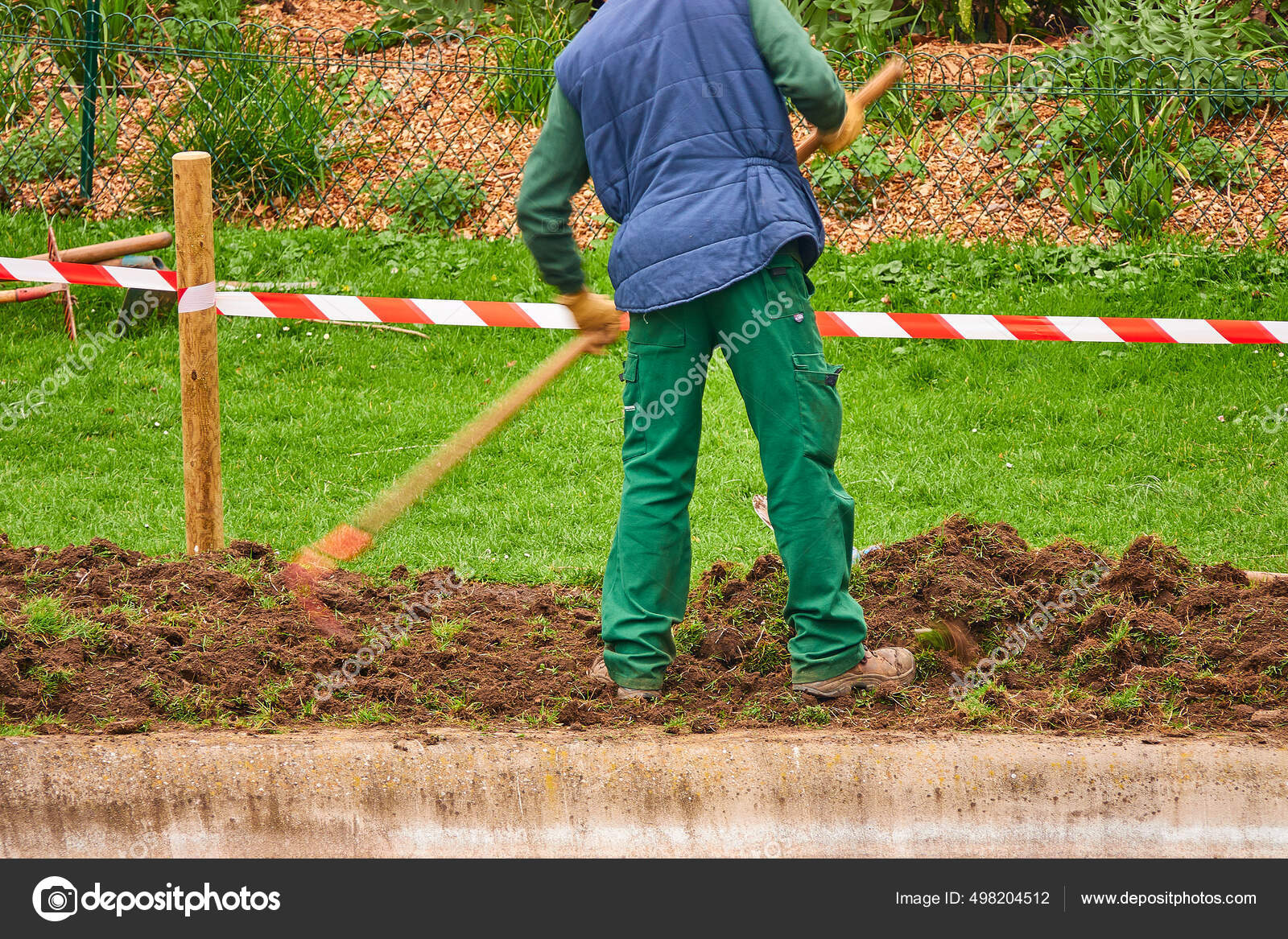 Worker Uses Hoe Process Land City Park Stock Photo by ©BestPhotoStudio ...