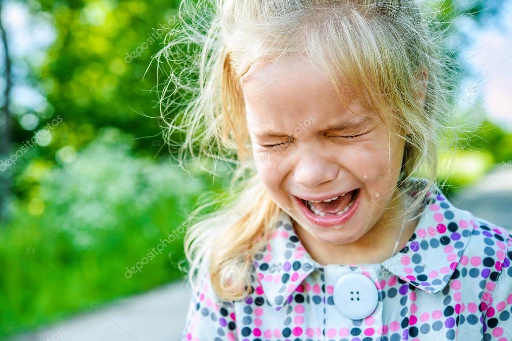 Sad little girl crying Stock Photo by ©BestPhotoStudio 72510019