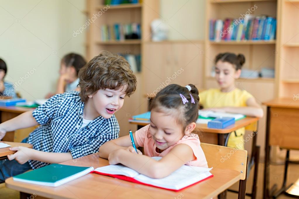 Classmates at school Stock Photo by ©Deklofenak 117051184