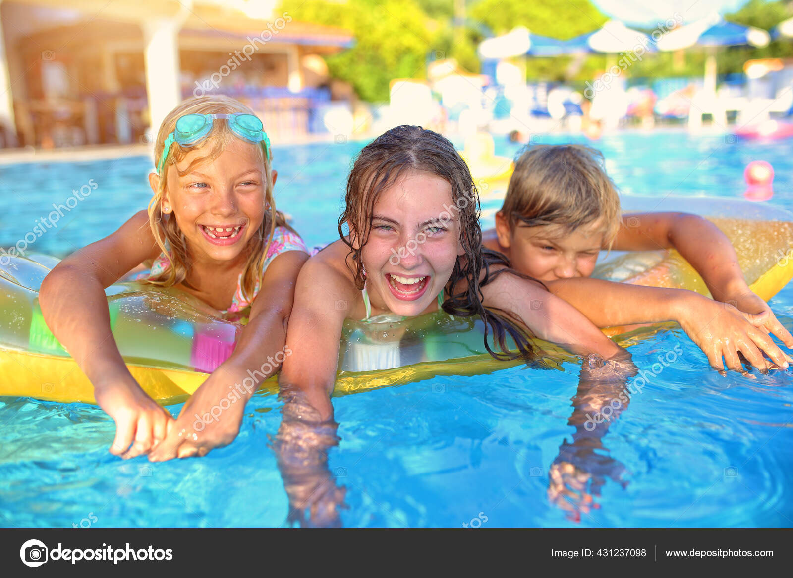 Kids Have Fun Warm Summer Day Pool Stock Photo by ©ambrozinio 431237098