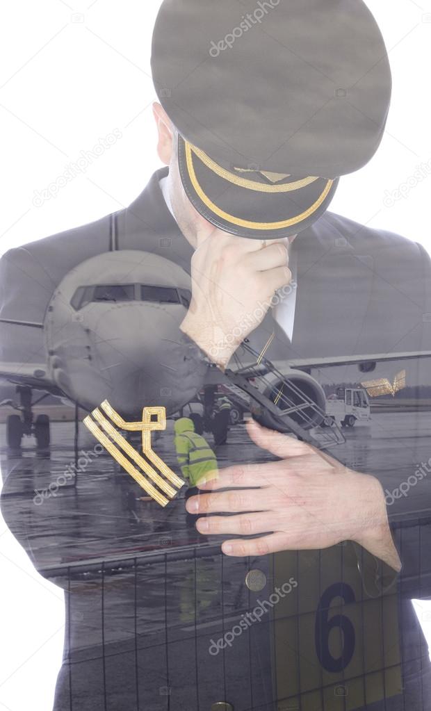Sad pilot at the airport Stock Photo by ©ambrozinio 69682981