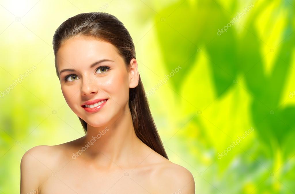 Girl on spring floral background Stock Photo by ©rbvrbv 104169628