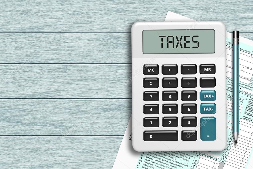 Calculator with taxes text and 1040 tax form lying on wooden de Stock ...