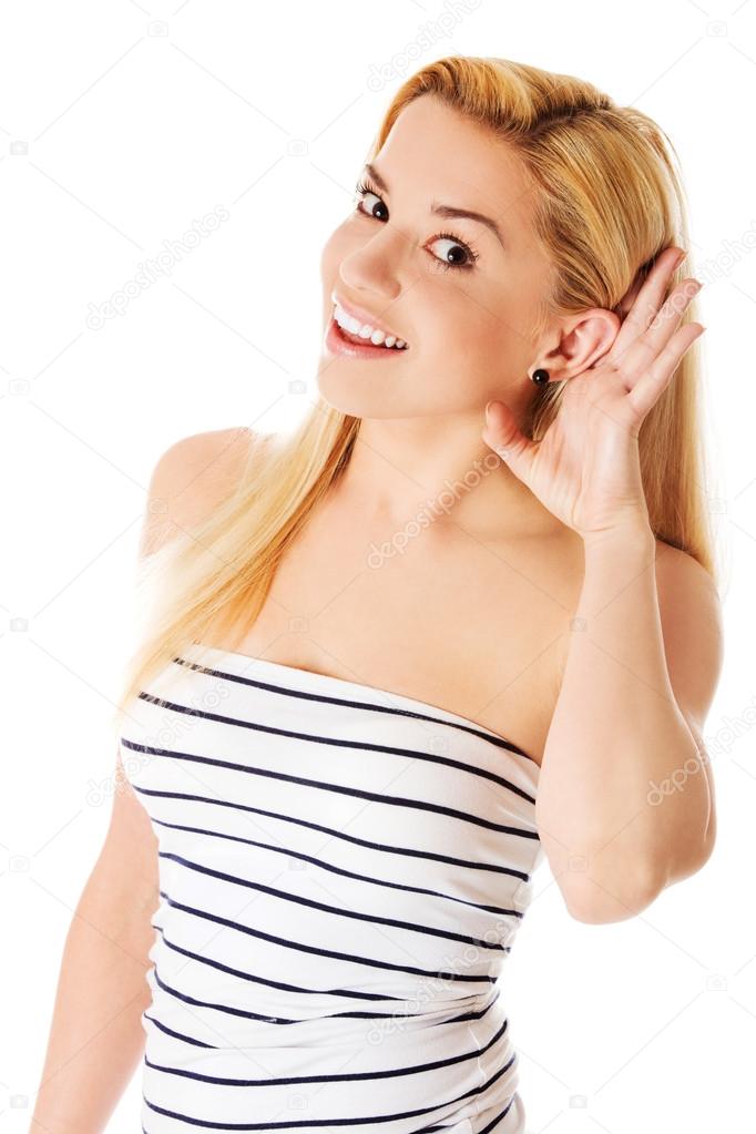 Young woman overhearing a conversation. Stock Photo by ©piotr_marcinski ...