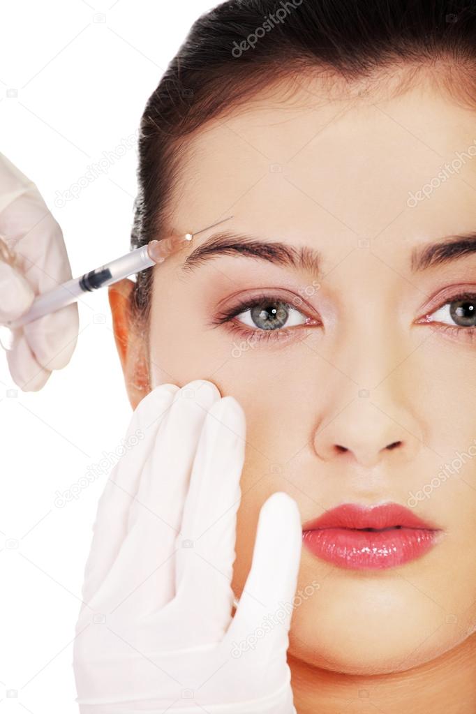Cosmetic botox injection Stock Photo by ©piotr_marcinski 58544725