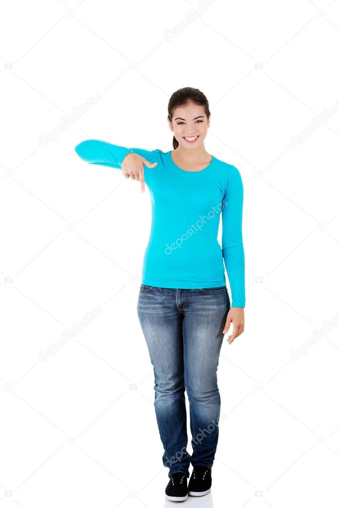 Woman pointing down — Stock Photo © piotr_marcinski #58575389